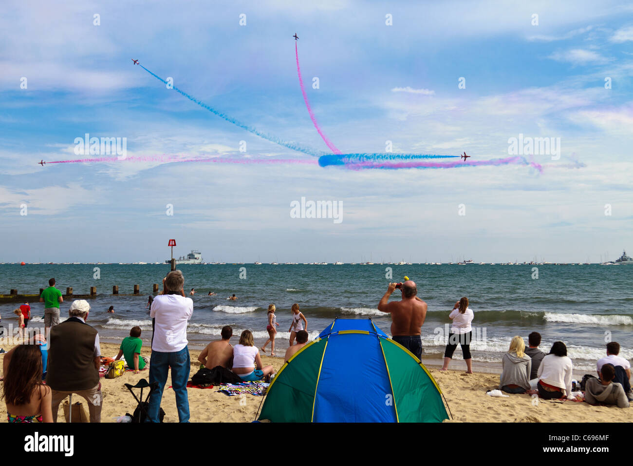 The Red Arrows do a display over the beach at Swansea Bay Stock Photo ...