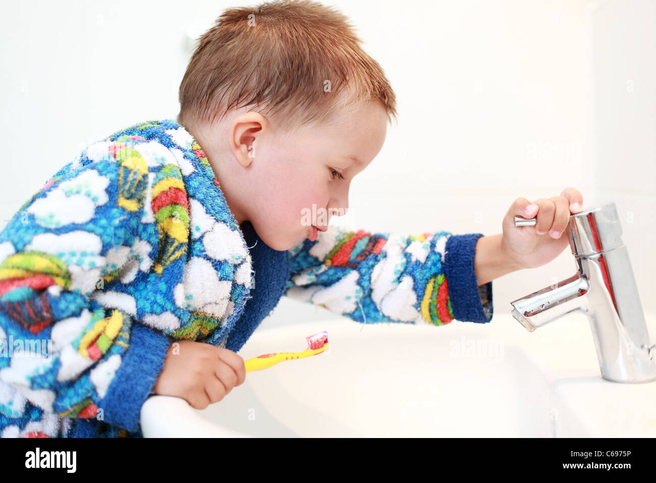 Dental care - small boy washing his teeth Stock Photo - Alamy
