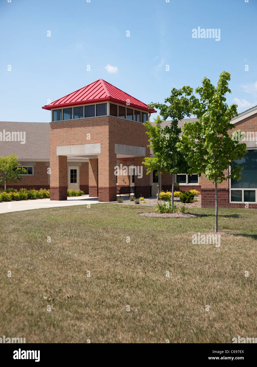 New elementary school on a beautiful summer day. The students are still ...