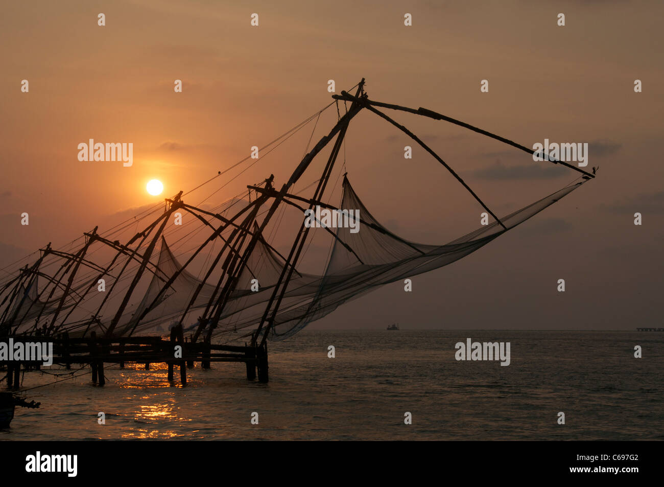 Chinese fishing nets at sunset Fort Cochin Kerala South India Stock ...