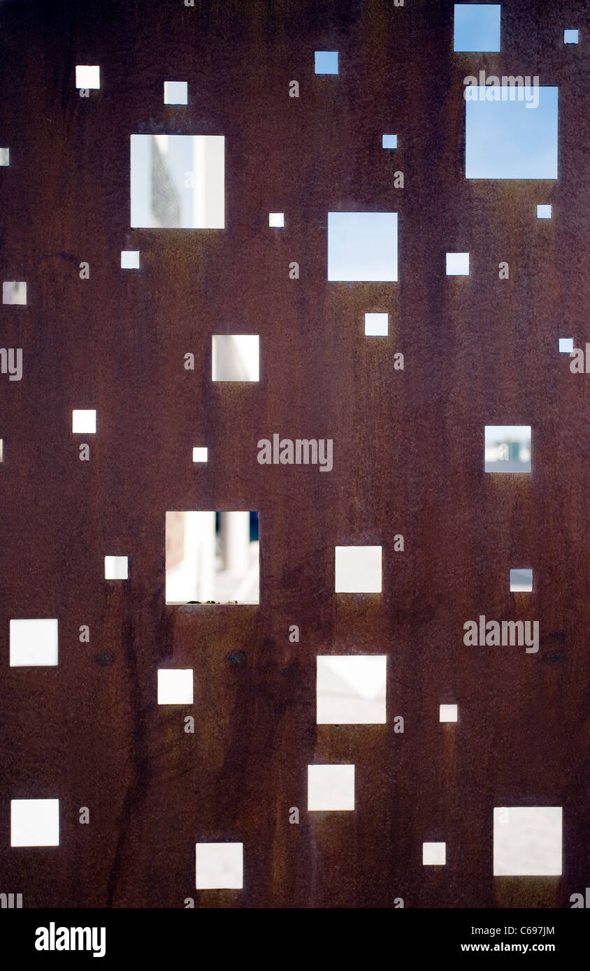 rustic metallic gate with square holes Stock Photo - Alamy