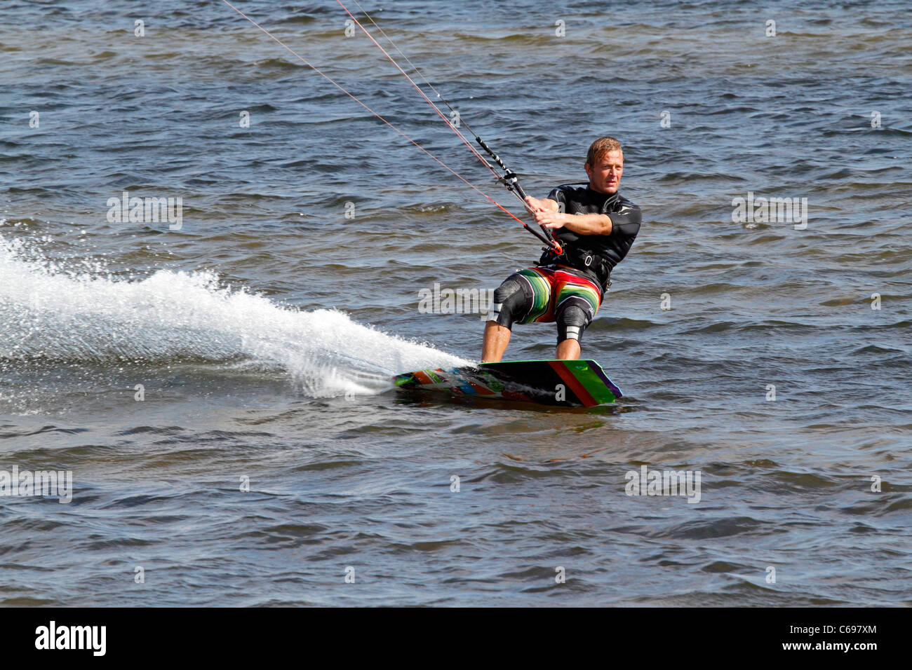Kitesurfer at Nivå Bay on a windy summer day, The Sound, Denmark Stock ...