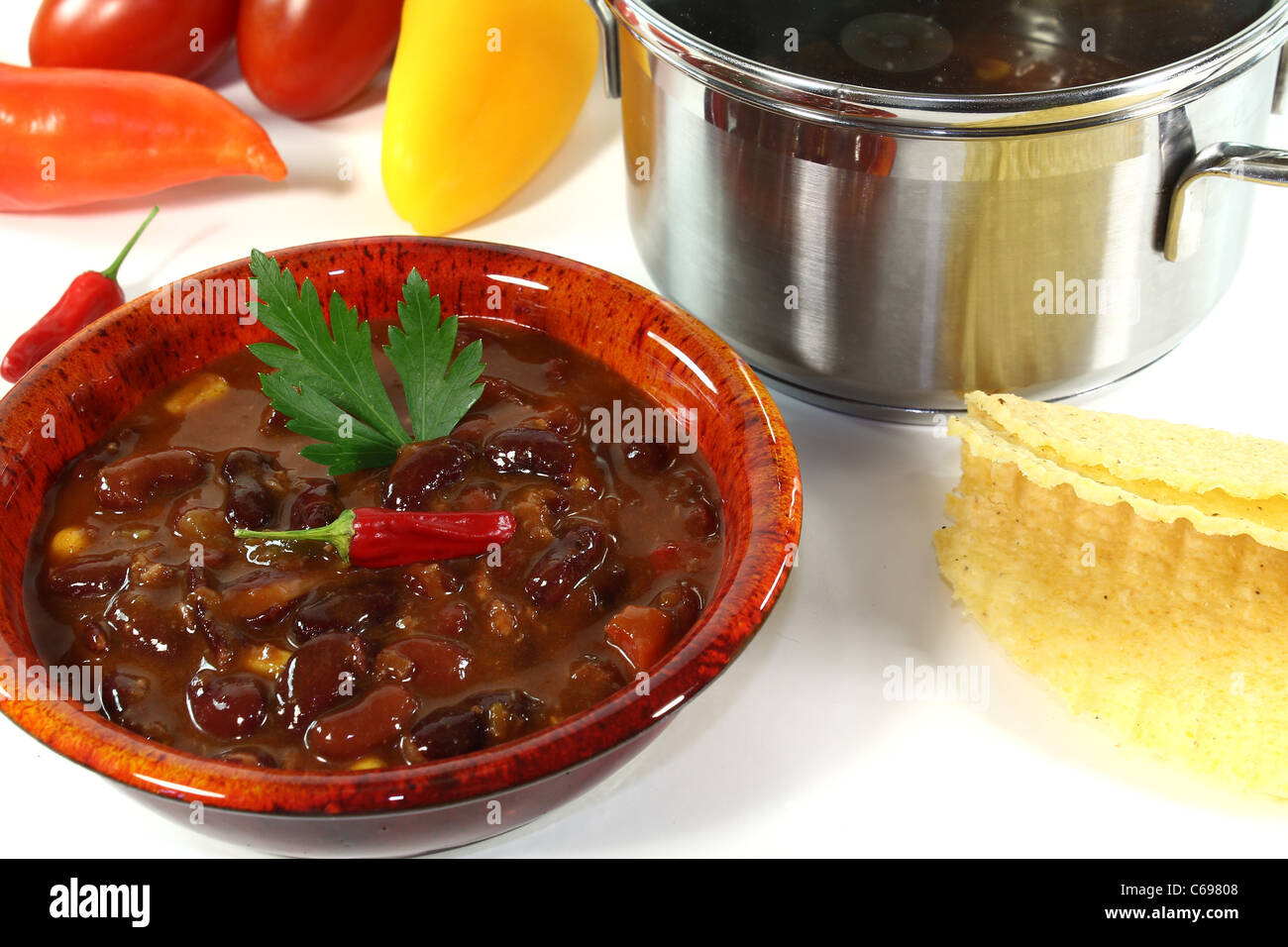 Chili con carne with kidney beans, beef, peppers and parsley Stock ...