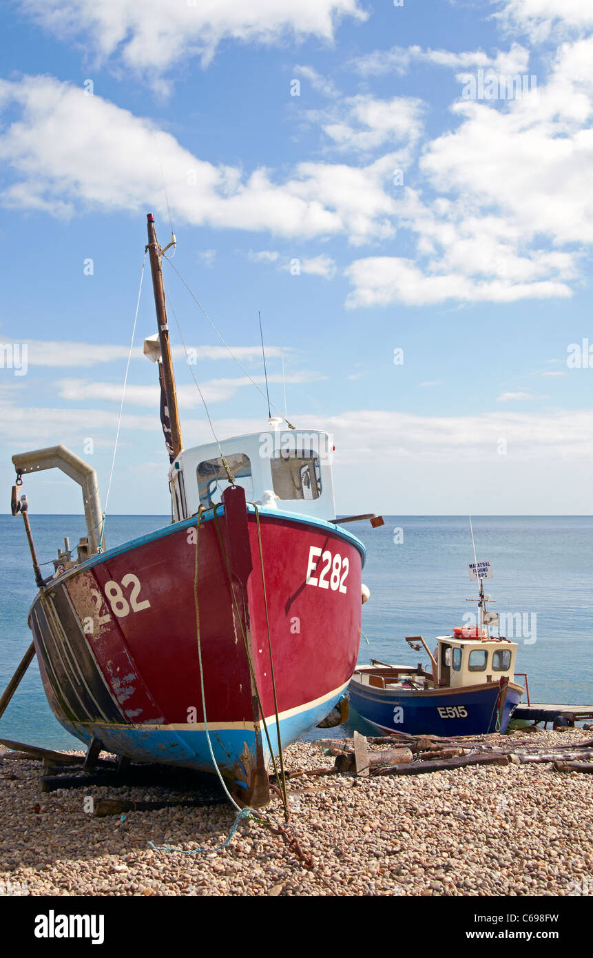 The beach at Beer, Devon, England with fishing boats, crab pots and ...
