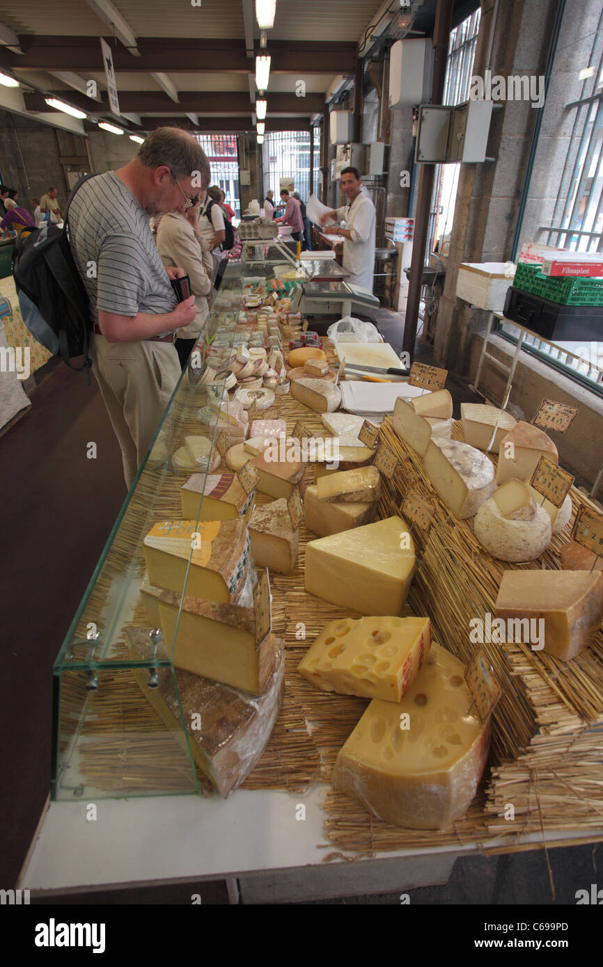 market cheese stall indoor, st malo, brittany, france Stock Photo - Alamy