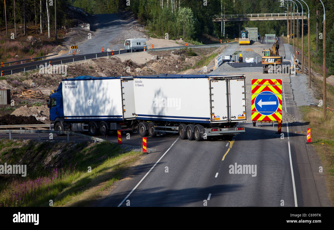 Roadworks on a highway traffic rerouted to temporary road , Finland ...