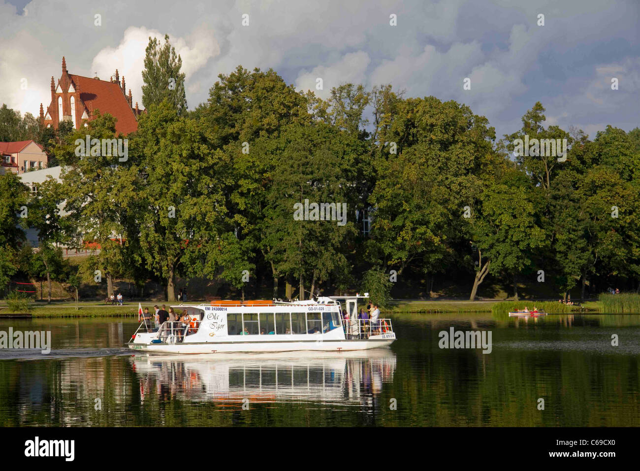 Lake jeziorak tourist boat church in background hi-res stock ...