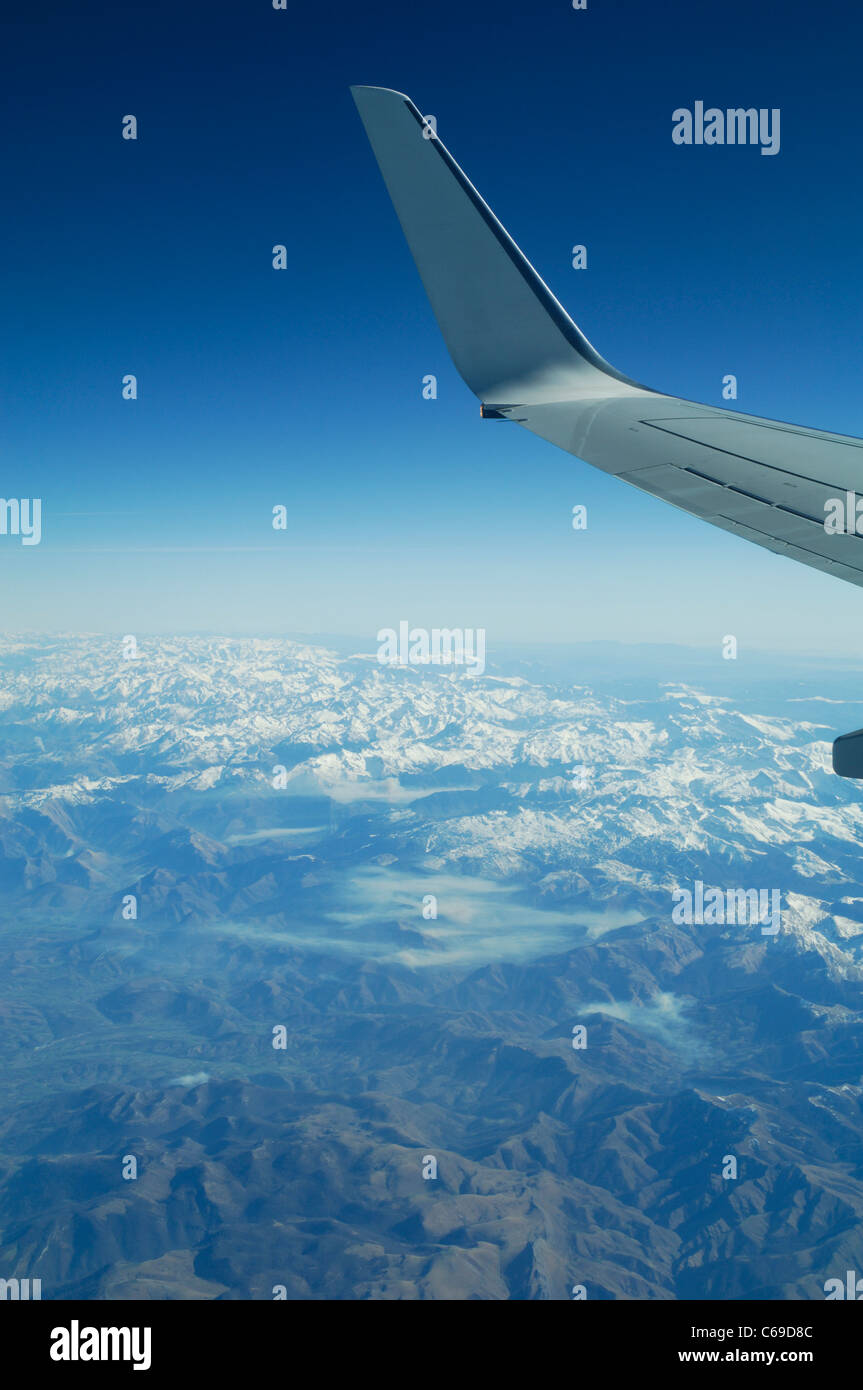 Aerial view from airliner plane of Pyrenees mountains range, border ...