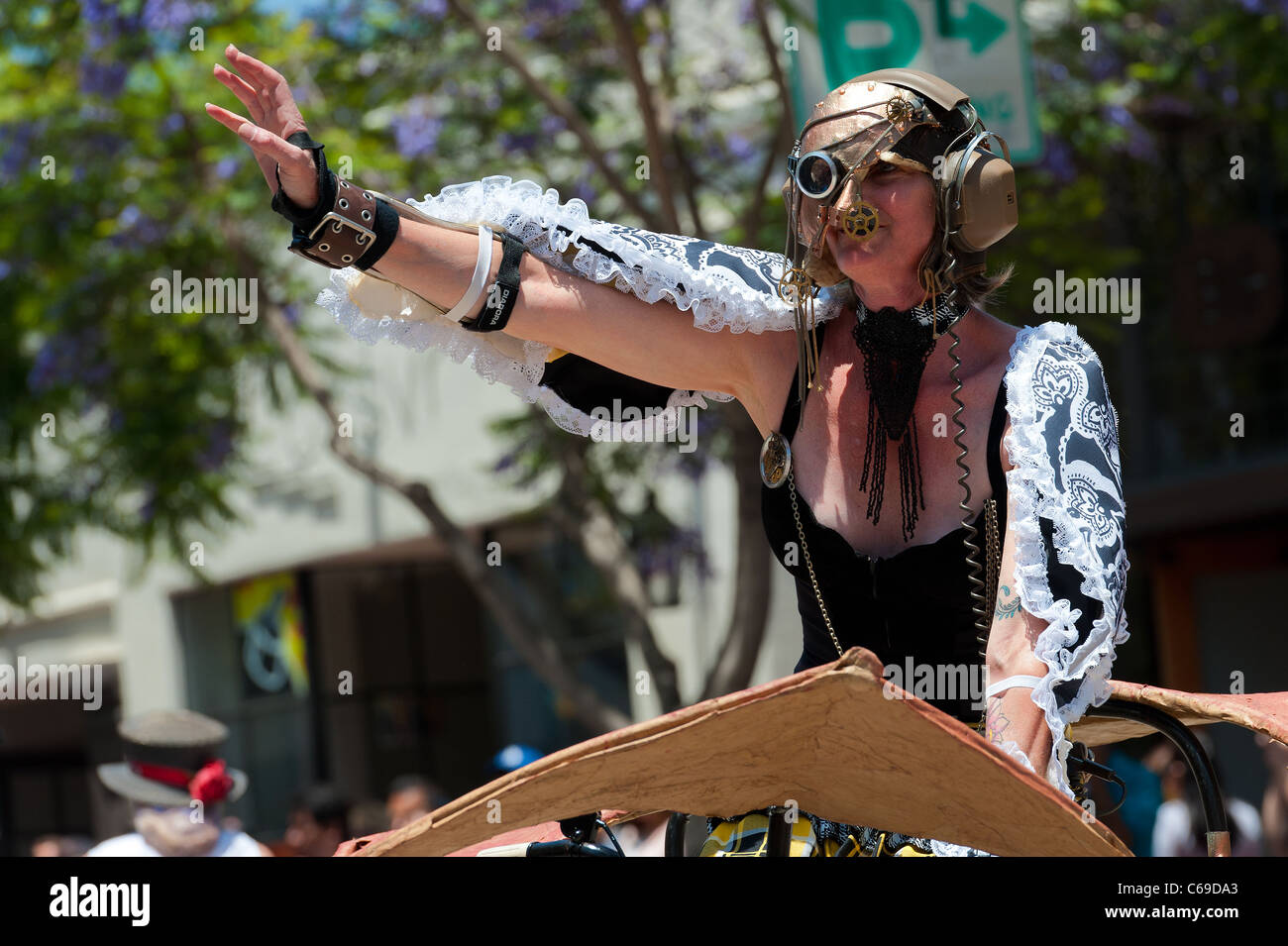 A performer at the Santa Barbara Solstice Parade, salutes the ...