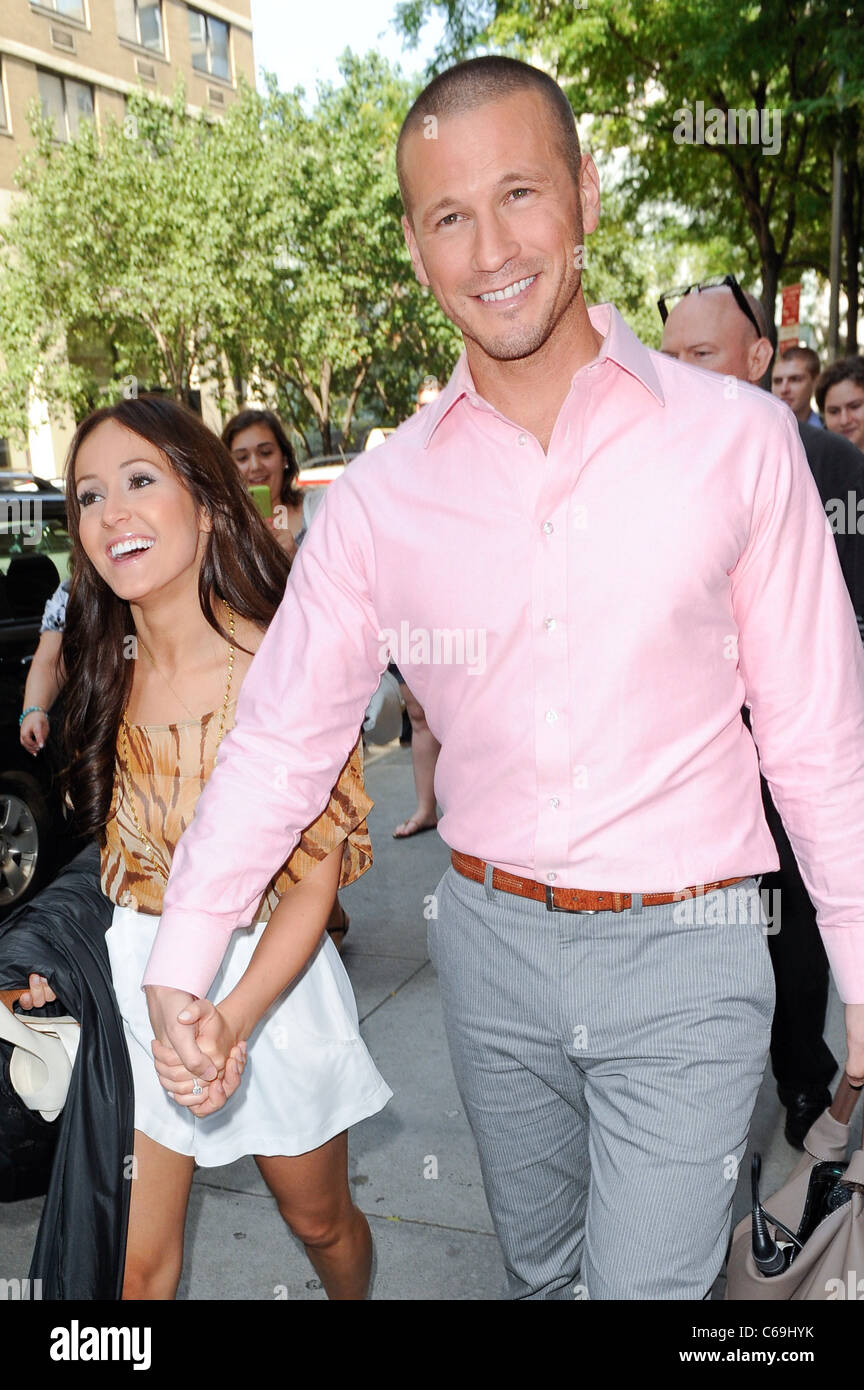 Ashley Hebert, JP Rosenbaum, enter the ABC Radio Studios out and about ...