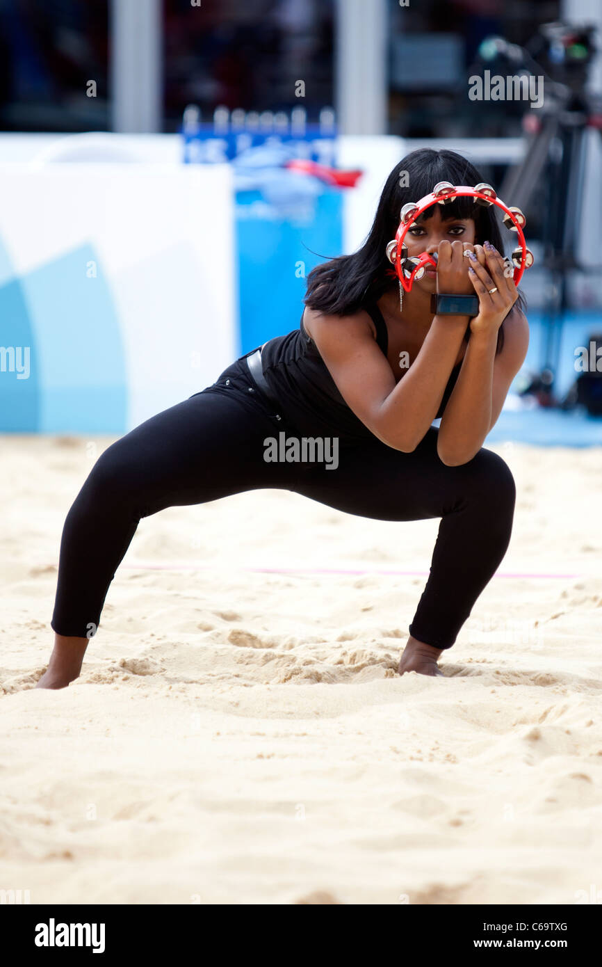 Dancer perform to VV Brown singing at the Visa FIVB women’s Beach ...