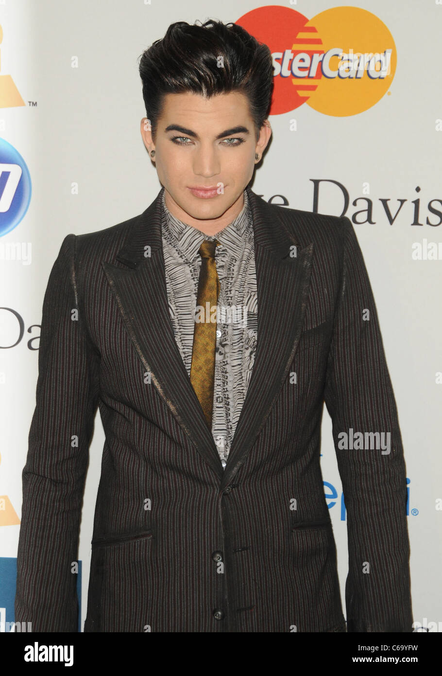 Adam lambert clive davis pre grammy party 2011 hi-res stock photography ...