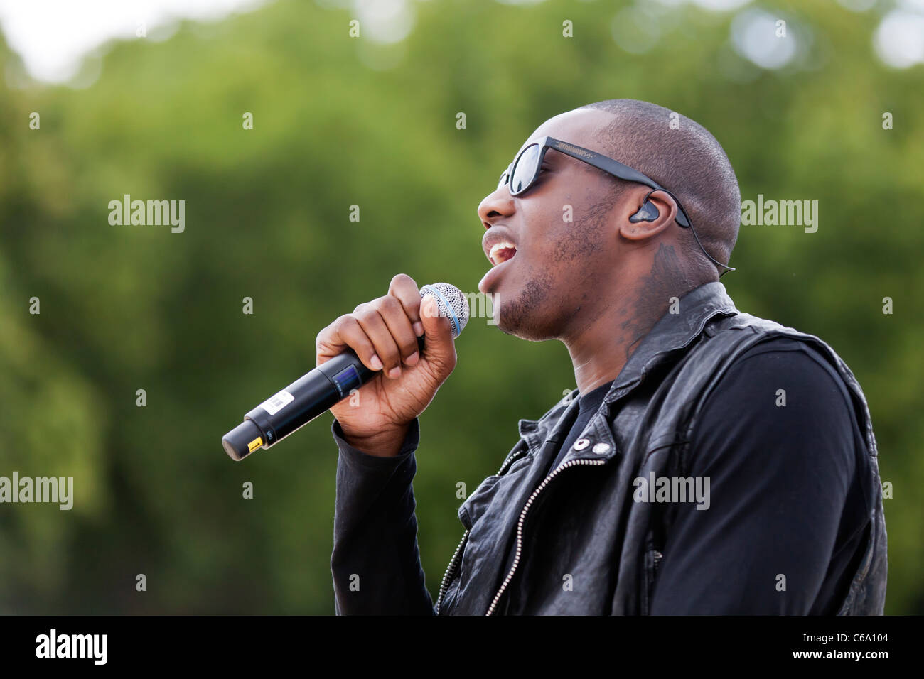 Loick Essien performing at the Visa FIVB women’s Beach Volleyball ...