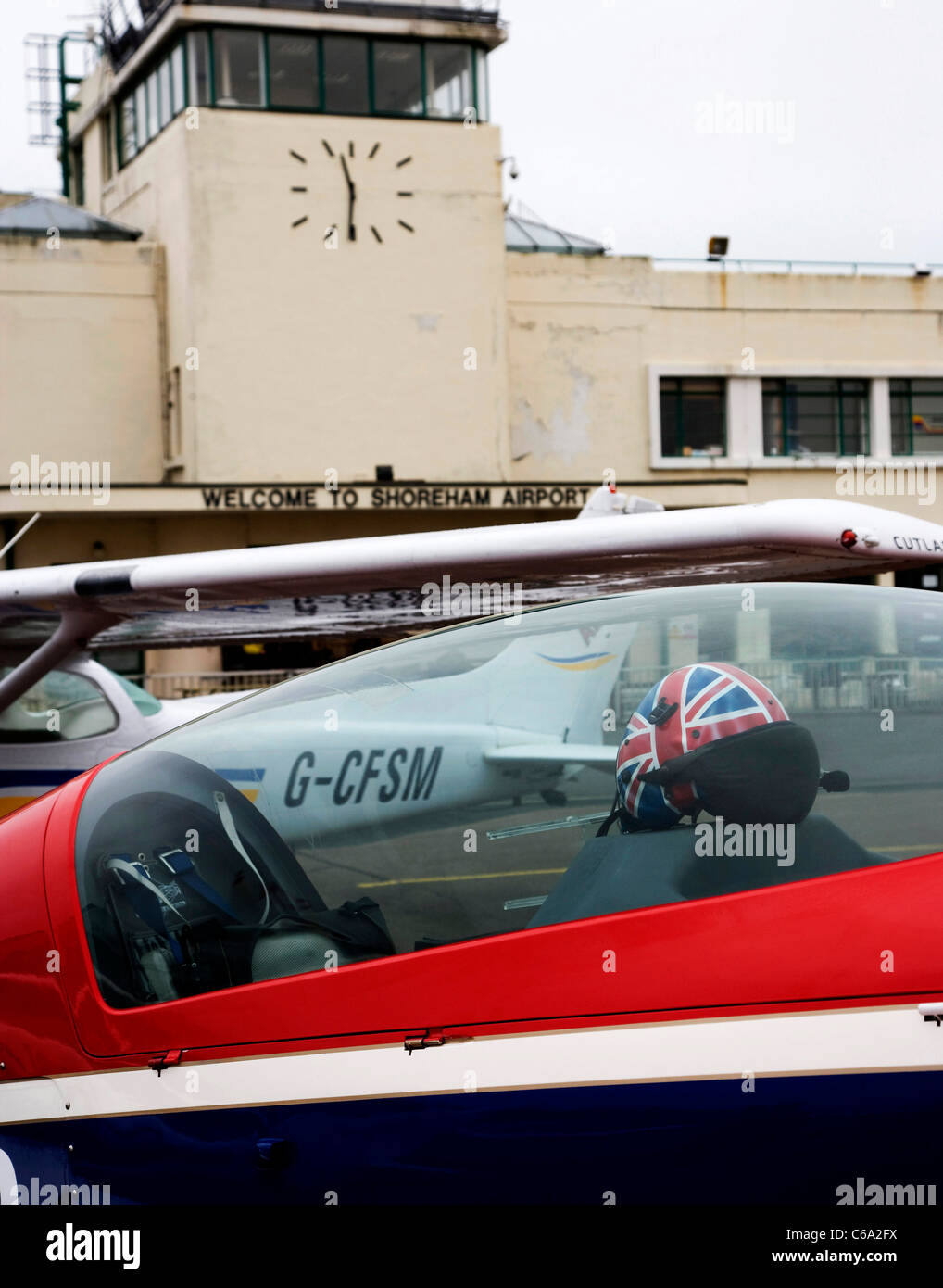 A flying helmet in a plane cockpit at Shoreham Airfield West Sussex ...