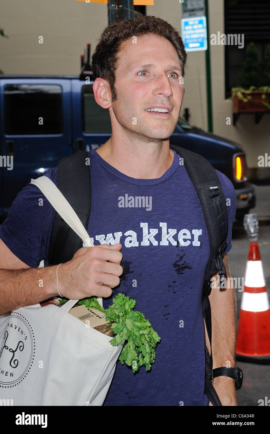 Mark Feuerstein, leaves his Upper East Side apartment out and about for ...