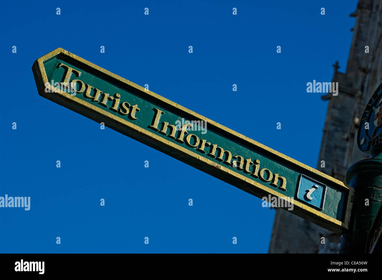 Close up of generic tourist visitor information sign signpost against ...
