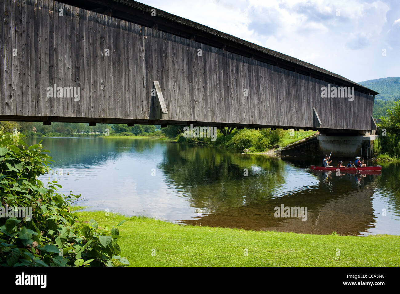 Family canoes east branch Delaware River under Downsville Covered ...