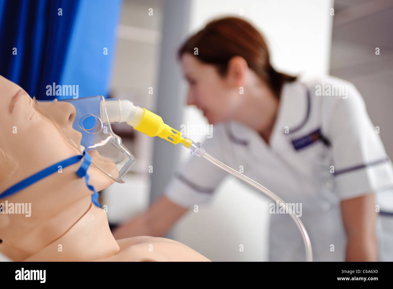 dummy patient wearing oxygen mask nurse blurred in background Stock ...