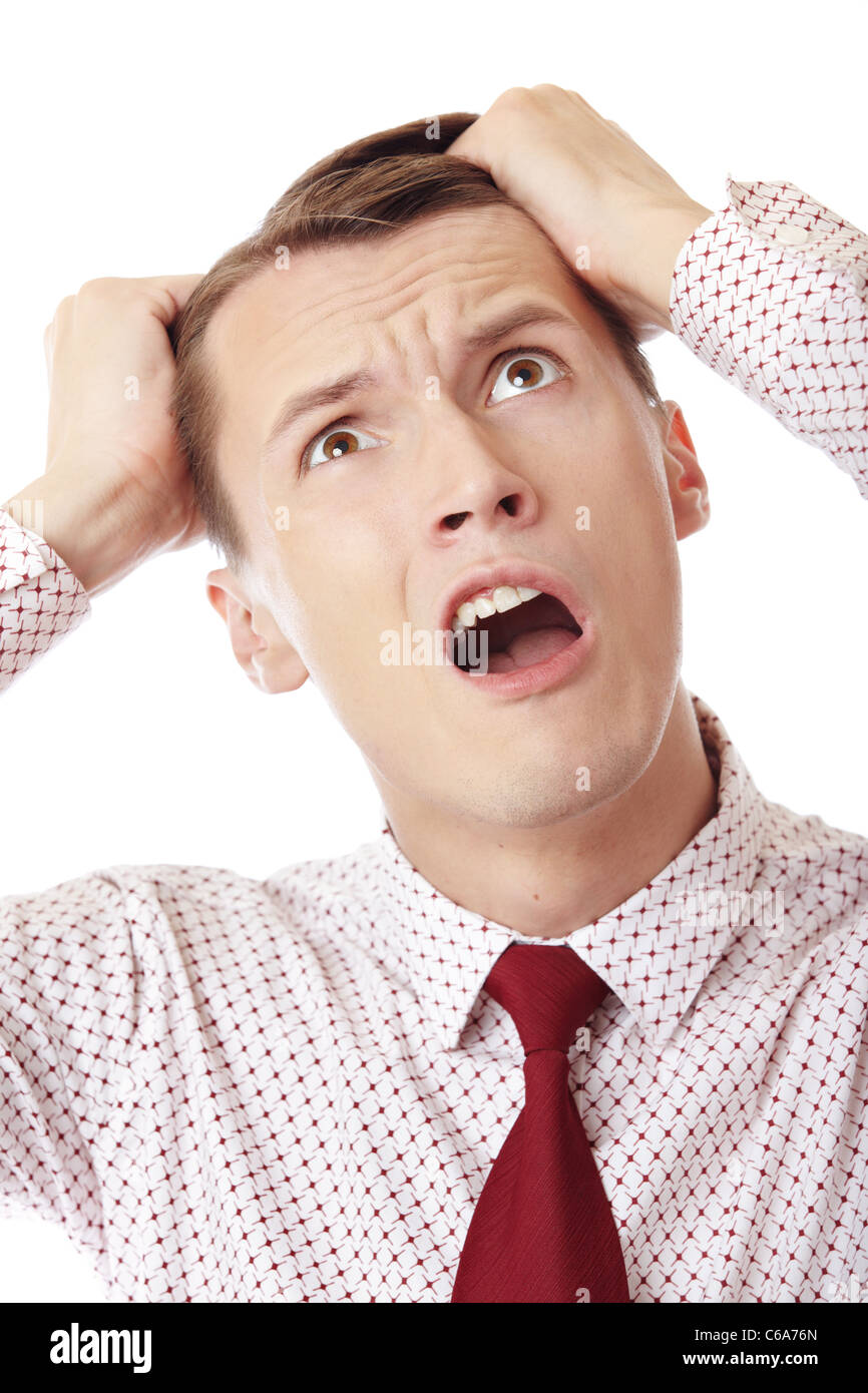 A businessman in trouble screaming on white background Stock Photo - Alamy
