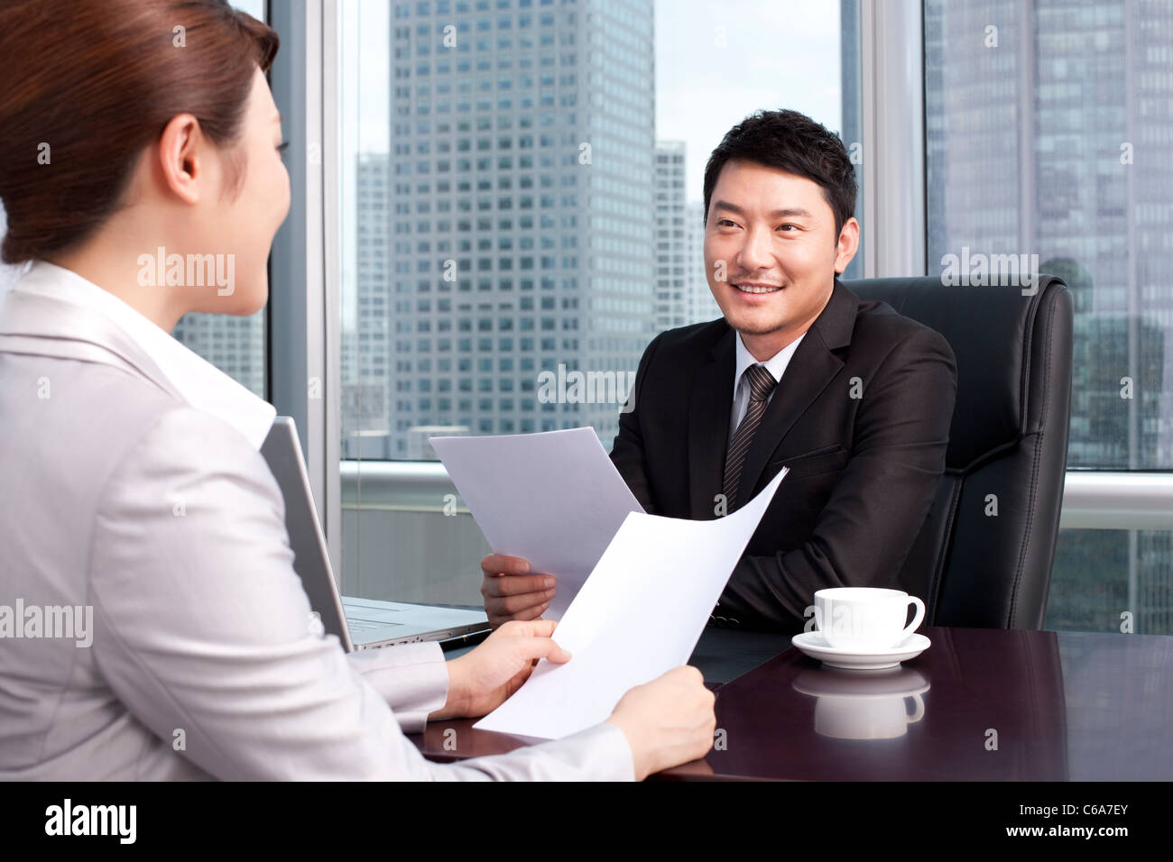 Working at the office Stock Photo - Alamy