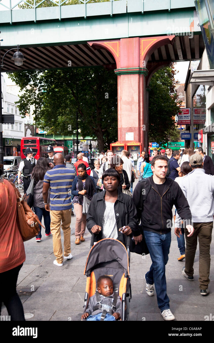 Street scene on Brixton Road, a multicultural area in South London ...