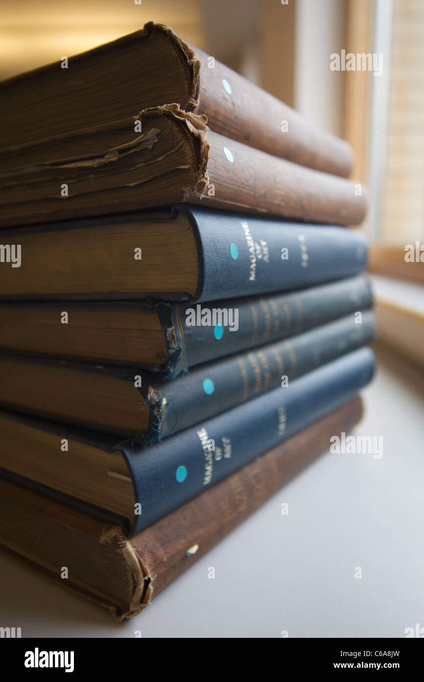 Stack of Old dog eared books in a neat stack Stock Photo - Alamy