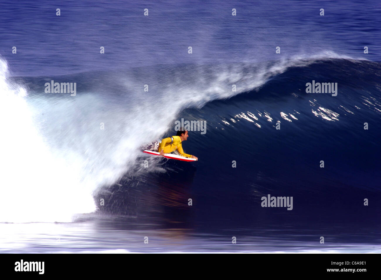 Body boarder surfing in the tube at the wave called Turtles in West ...