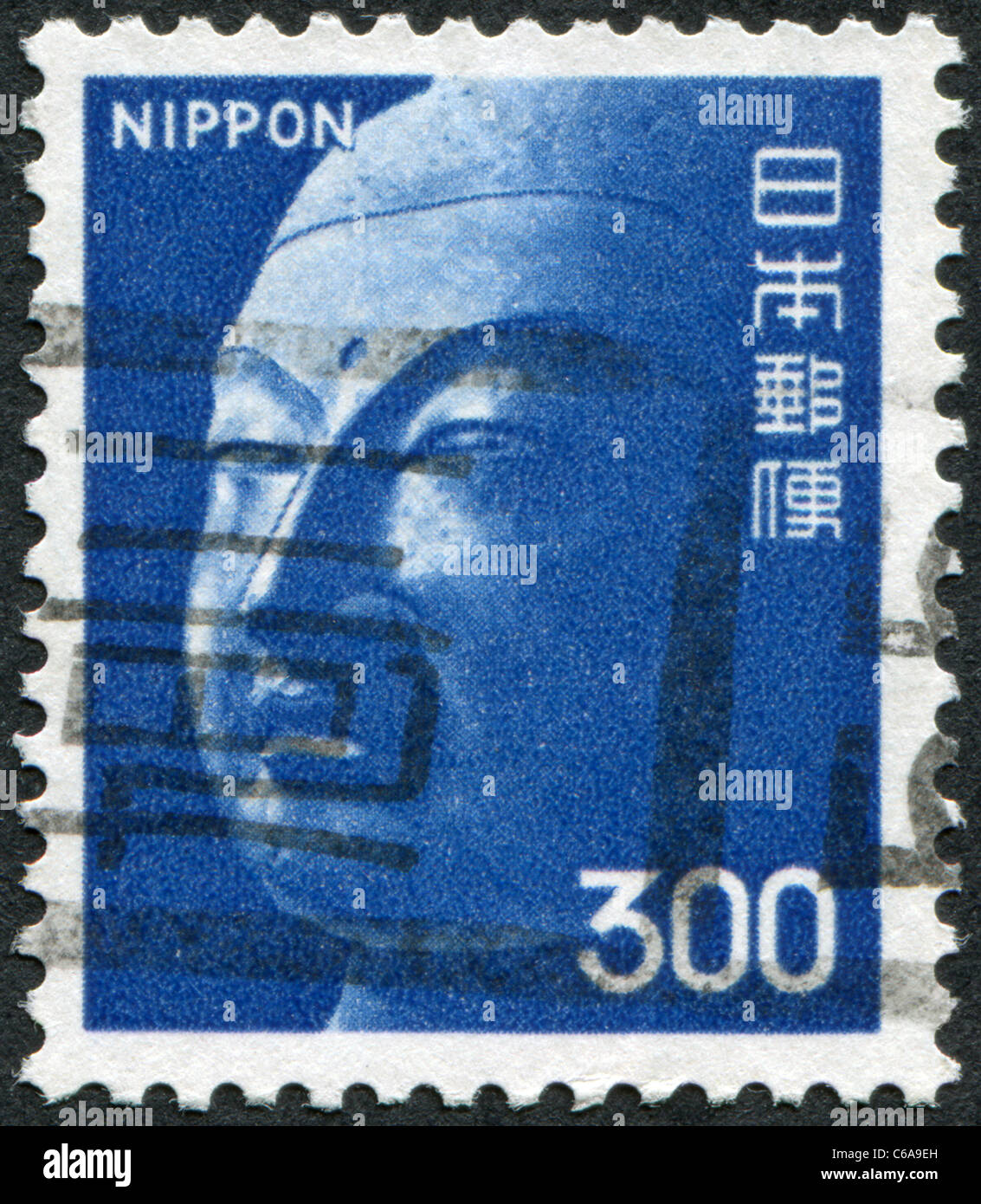 JAPAN - 1974: A stamp printed in Japan, depicts the head of the Buddha ...