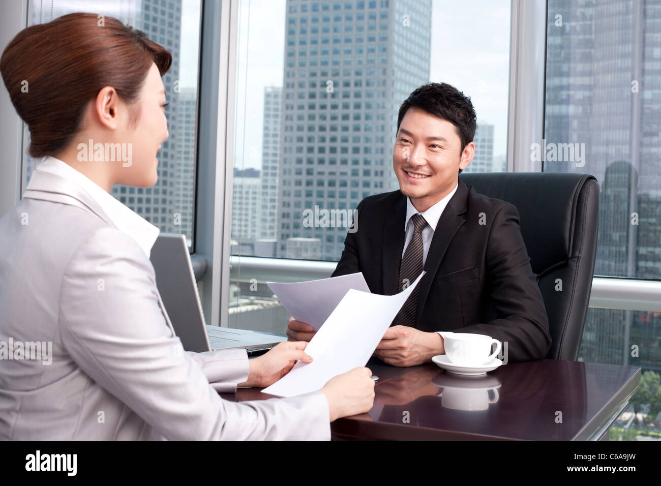 Working at the office Stock Photo - Alamy