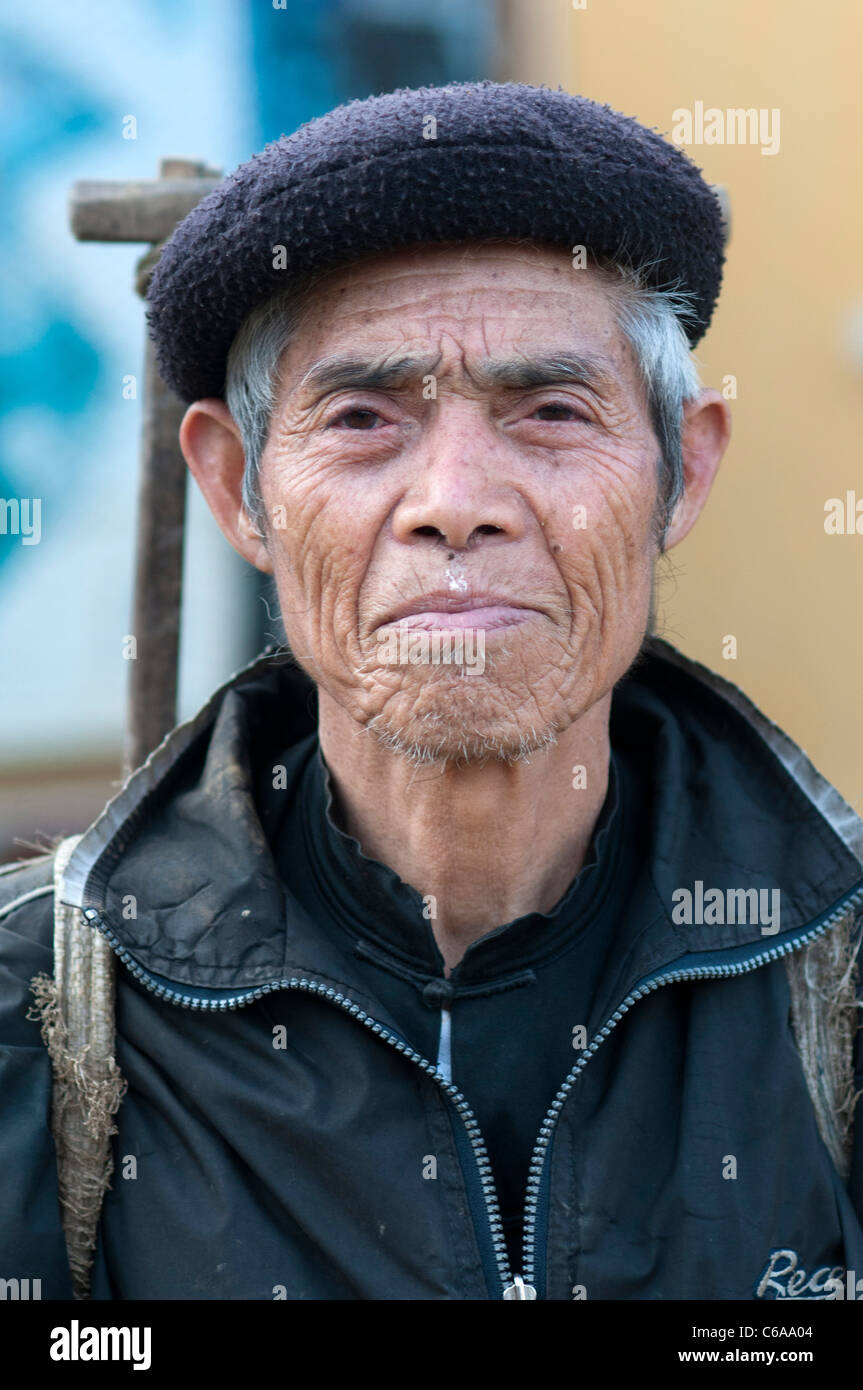 Portrait of a Hmong man in the city of Sapa, Vietnam Stock Photo - Alamy