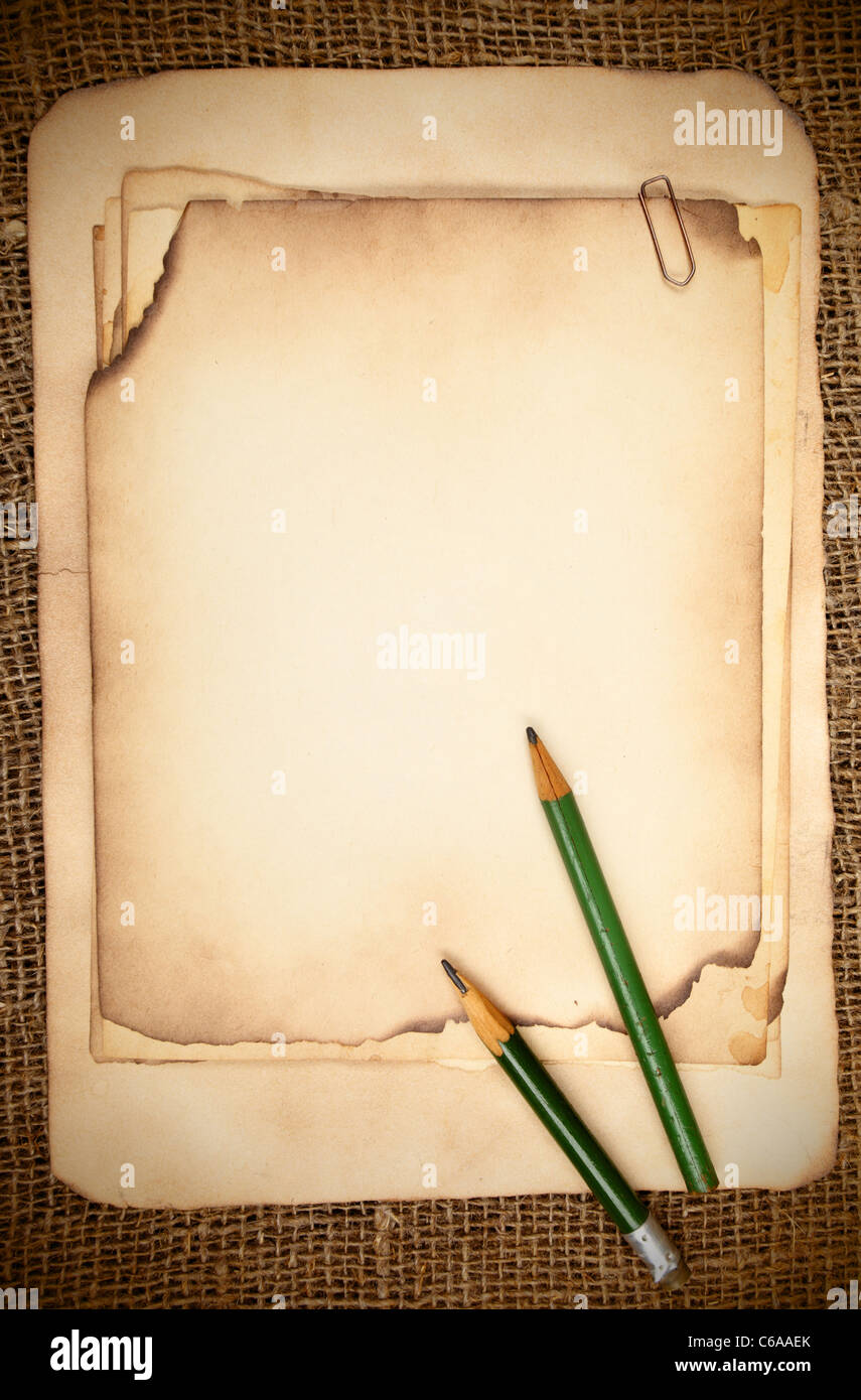 Still-life with old papers and pencils Stock Photo - Alamy