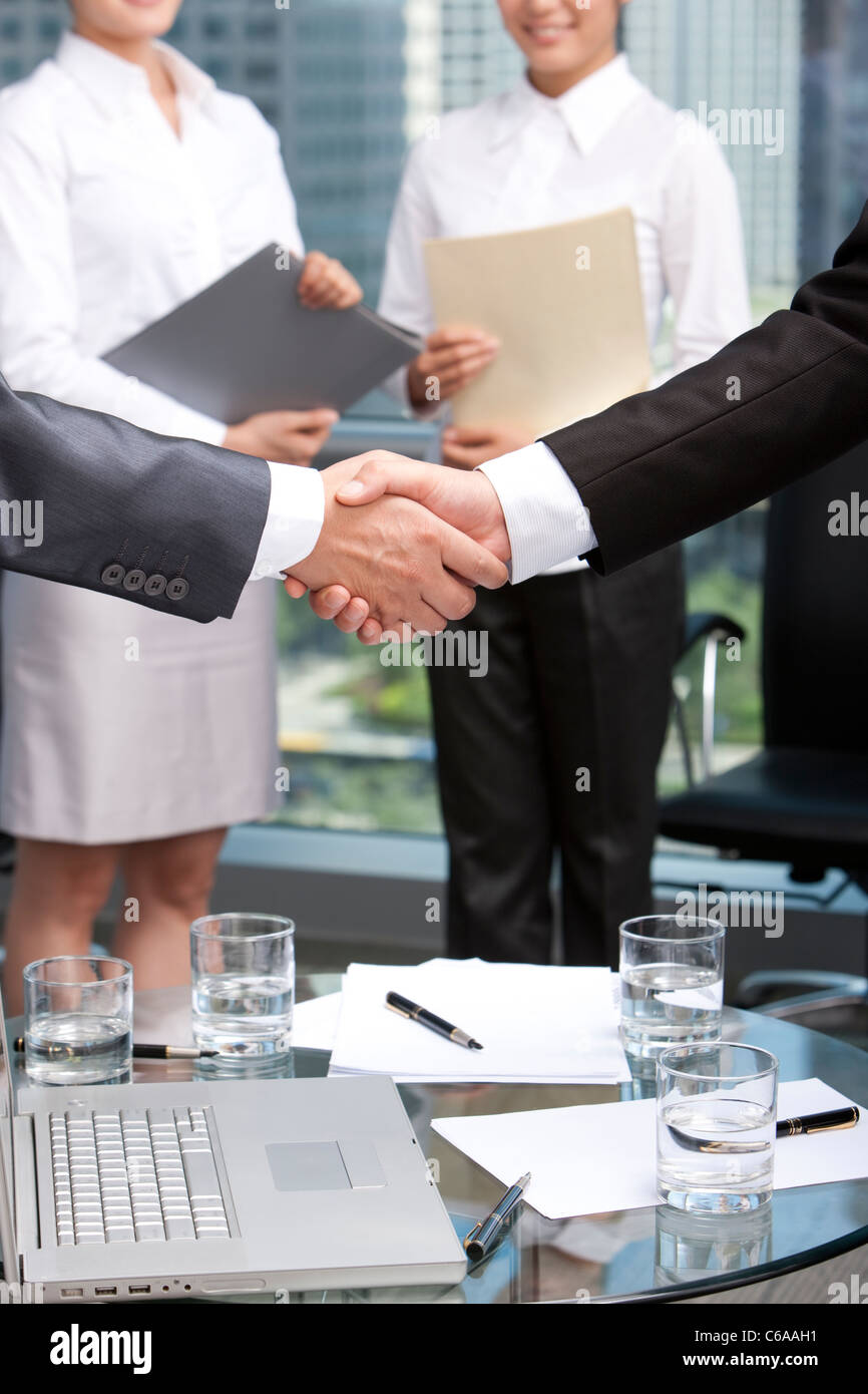 Handshake at the office Stock Photo - Alamy