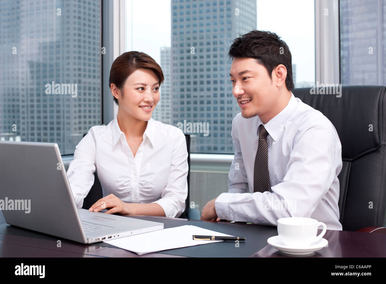 Working at the office Stock Photo - Alamy