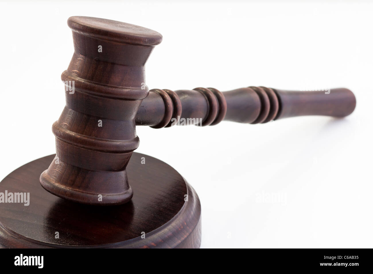 wooden judge gavel and wooden stand on a white background Stock Photo ...