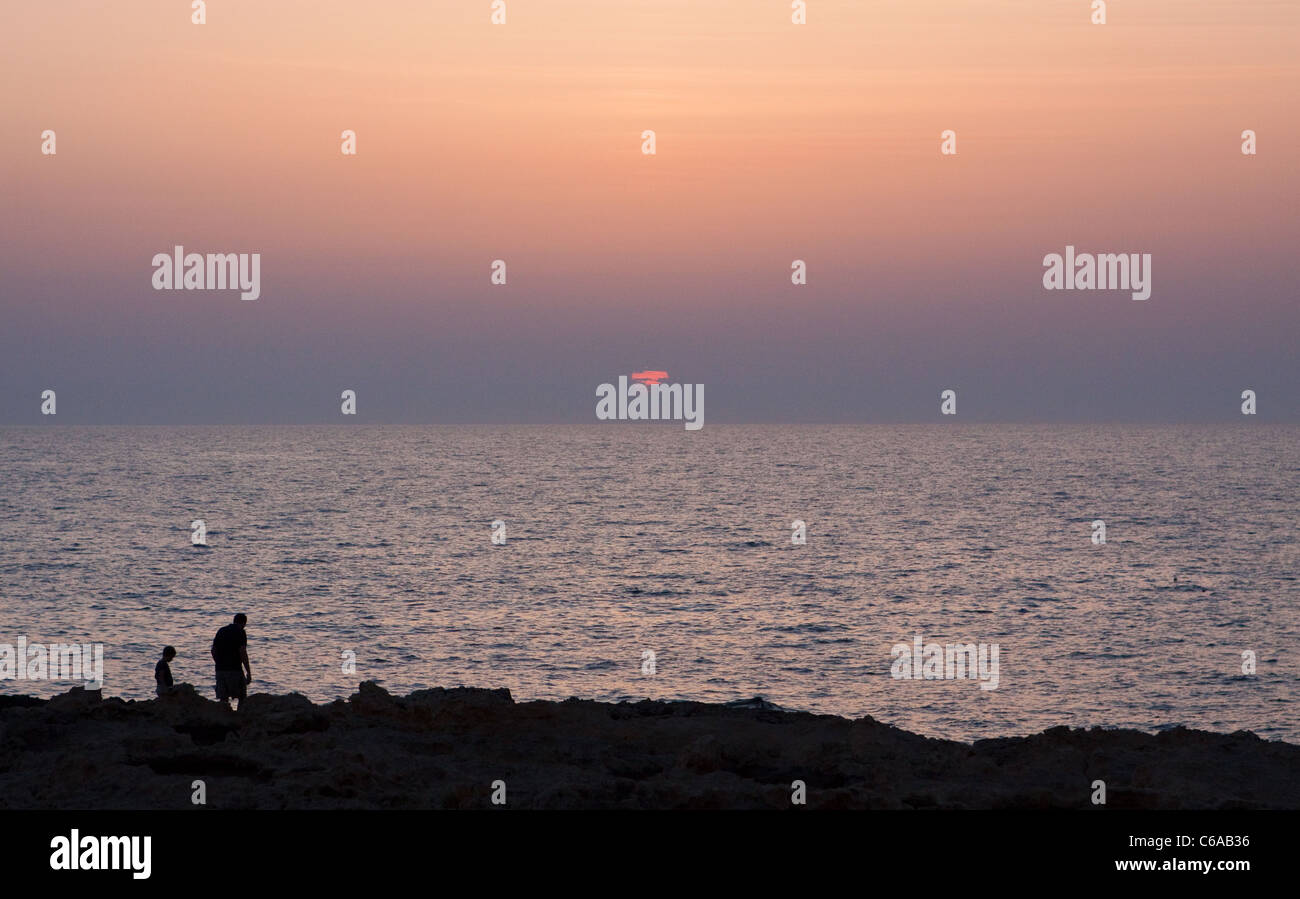Sunset at Dwejra Point near Azure Window, Gozo, Malta Stock Photo - Alamy