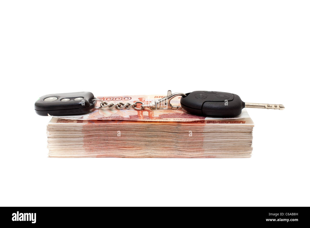 Car keys on stack of Russian money isolated on white background Stock ...
