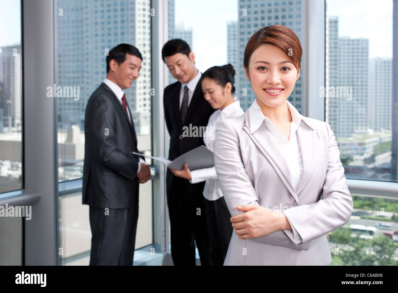 Portrait of businesspeople at the office Stock Photo - Alamy