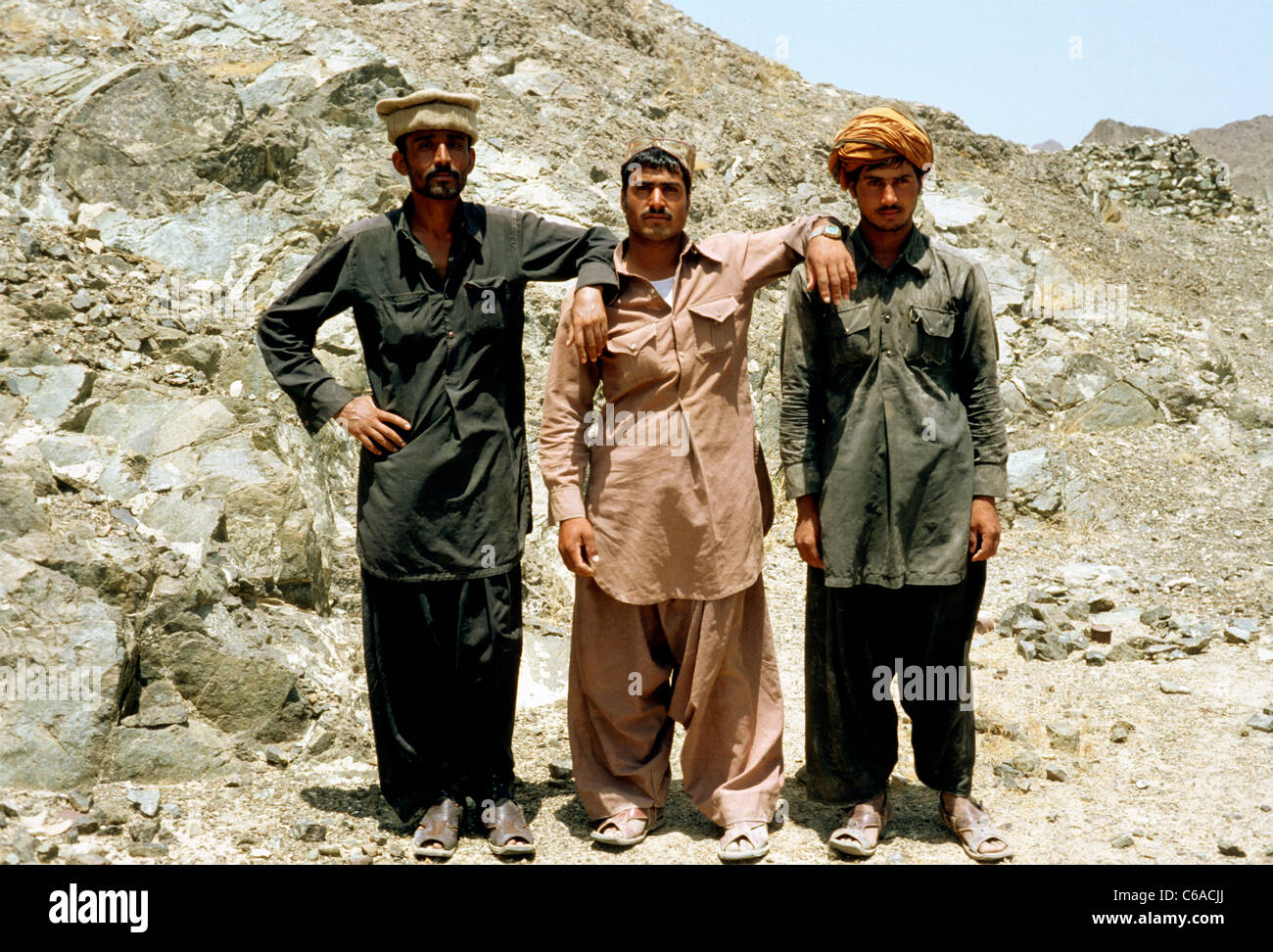 Three Pakistani labourers, United Arab Emirates Stock Photo - Alamy