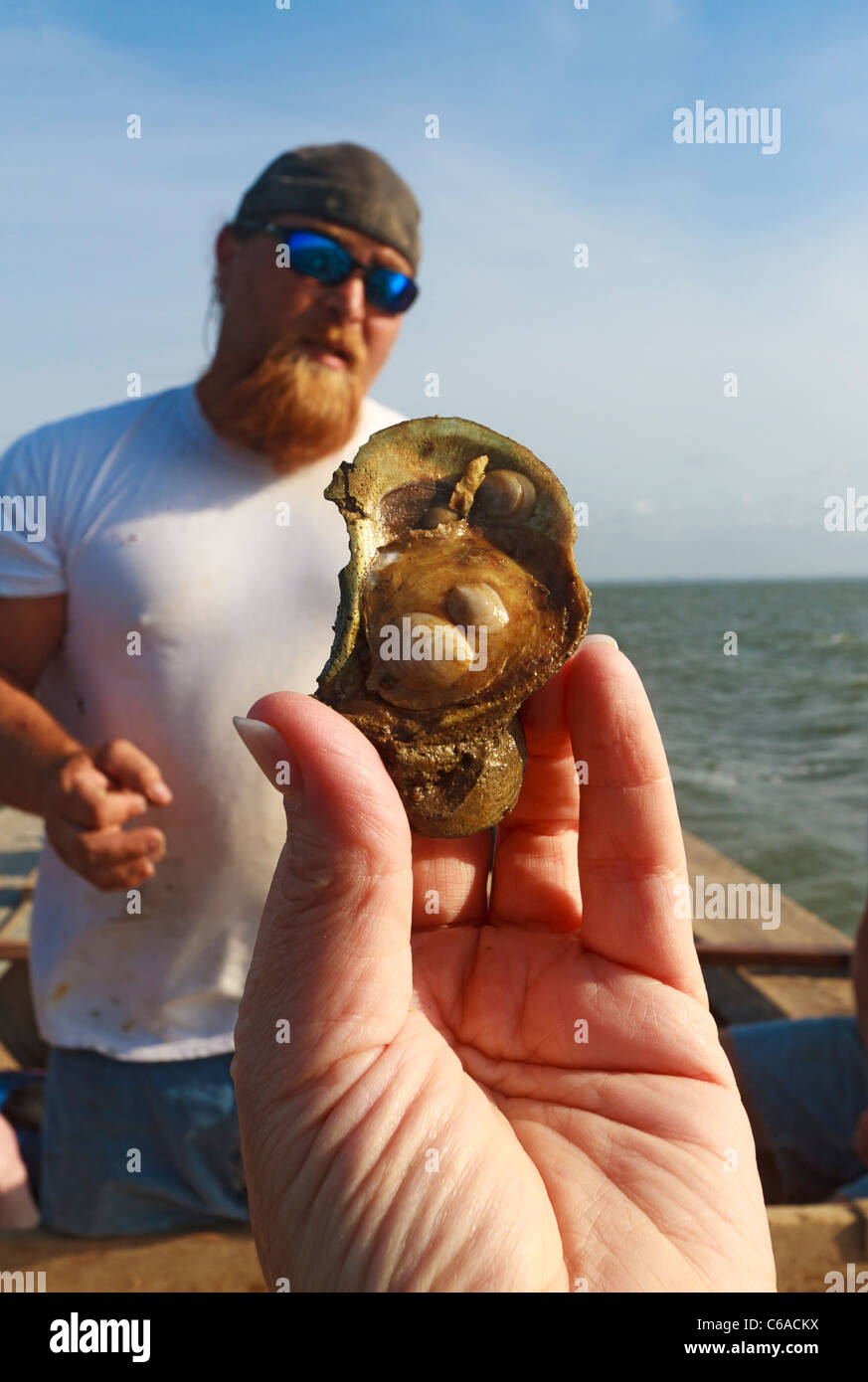 Man caught hand his baby hi-res stock photography and images - Alamy