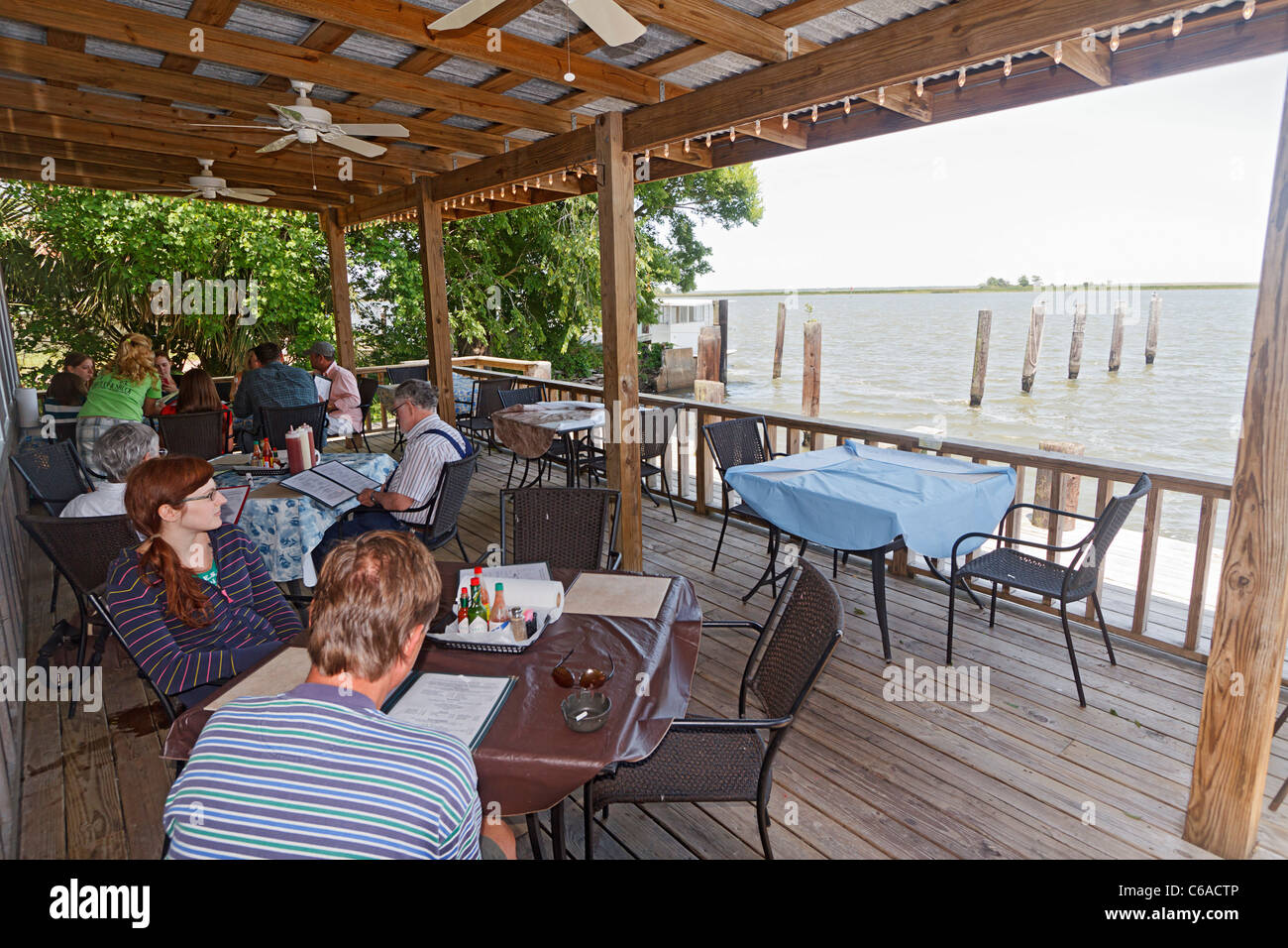 Boss Oyster, rustic restaurant with open air tables on a deck ...