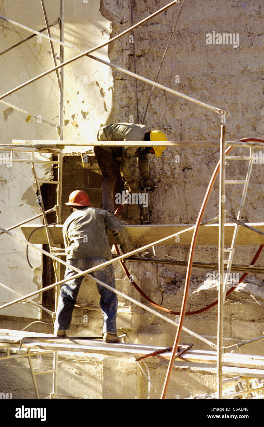 Man demolishing wall hi-res stock photography and images - Alamy