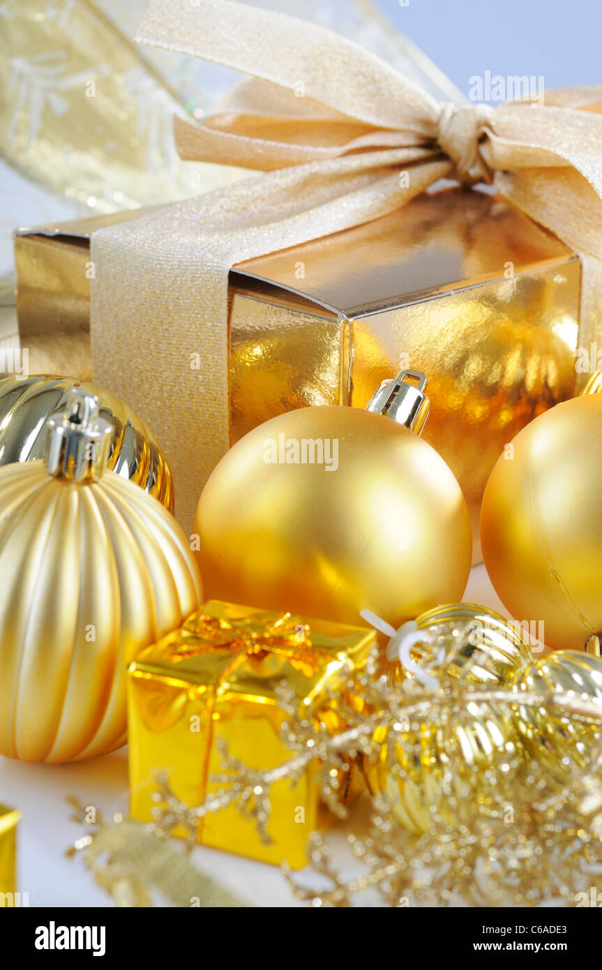 Gold Christmas Gift And Decorations Stock Photo - Alamy