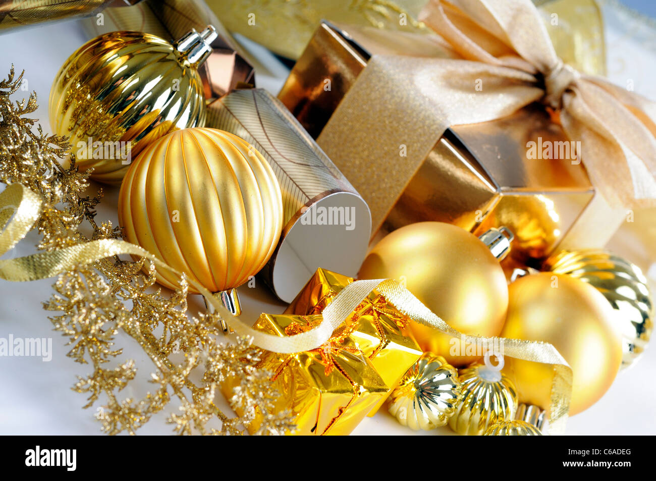 Gold Christmas Gift And Decorations Stock Photo - Alamy