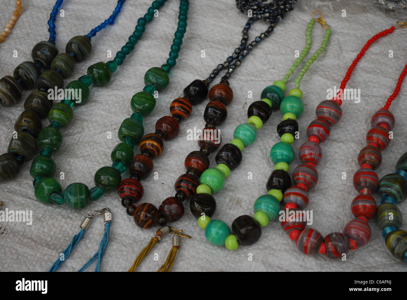 ear ring and stone necklace Stock Photo - Alamy