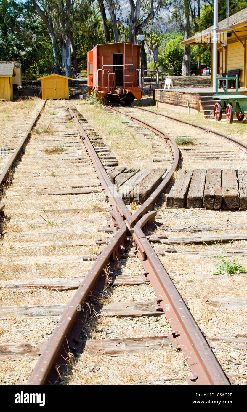 Caboose on rail road siding in station Stock Photo - Alamy