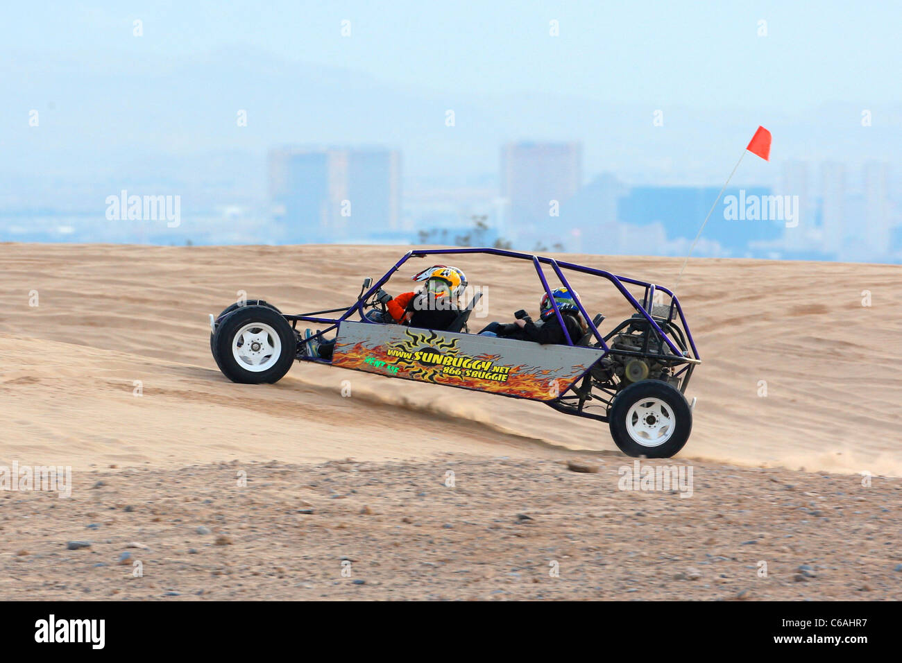 Katie Price and Alex Reid take a ride in a dune buggy around the Nevada ...