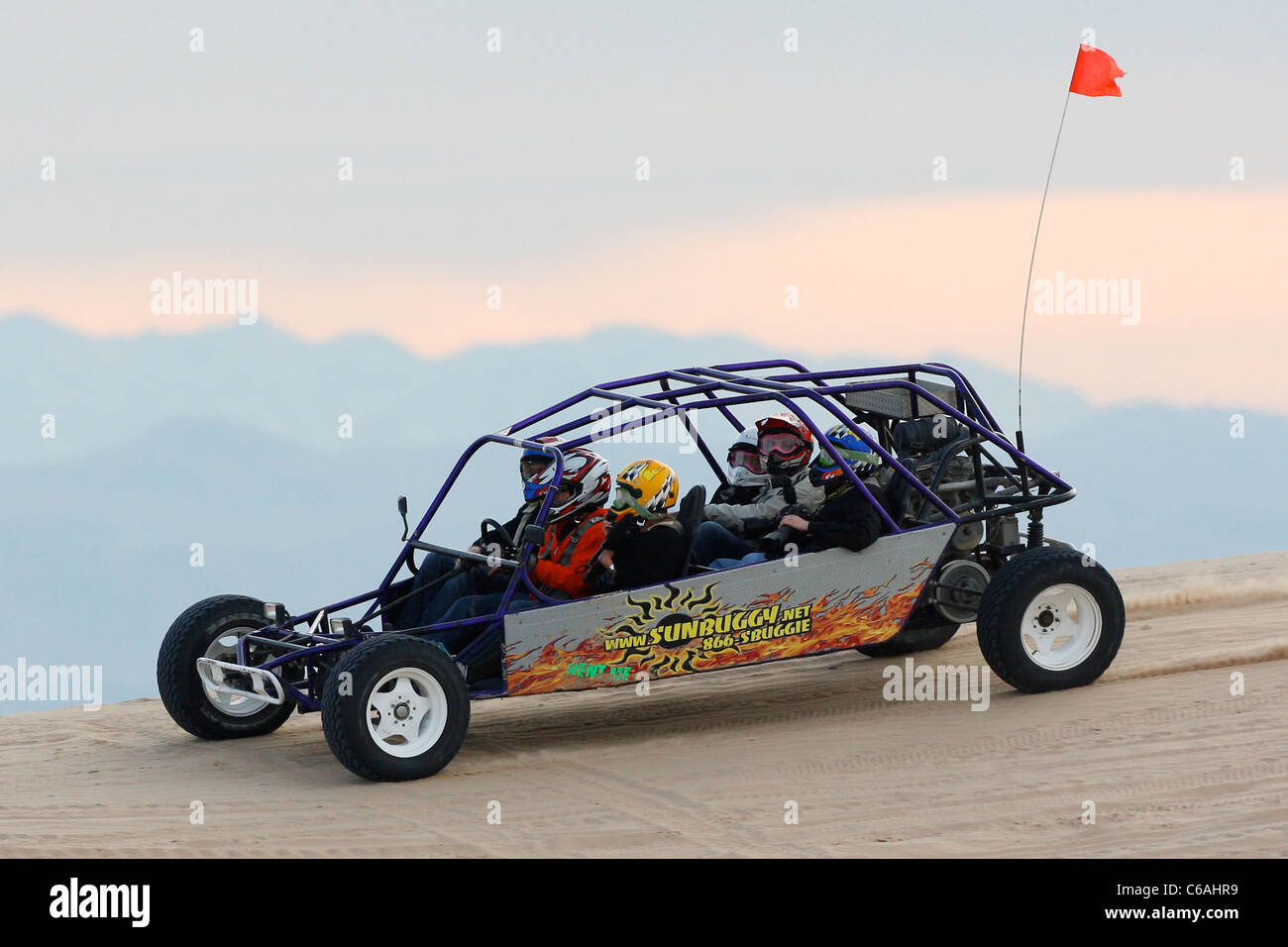 Katie Price and Alex Reid take a ride in a dune buggy around the Nevada ...