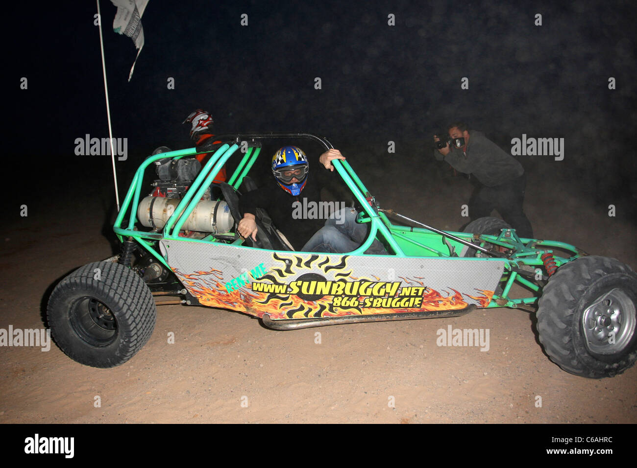 Alex Reid gets out of the dune buggy after he took a ride around the ...