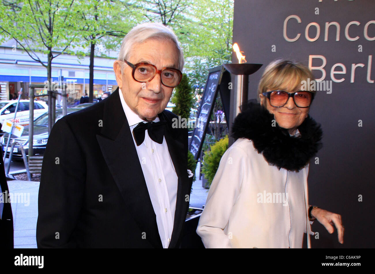 Ken Adam and his wife Letizia outside the Concorde Hotel on their way ...
