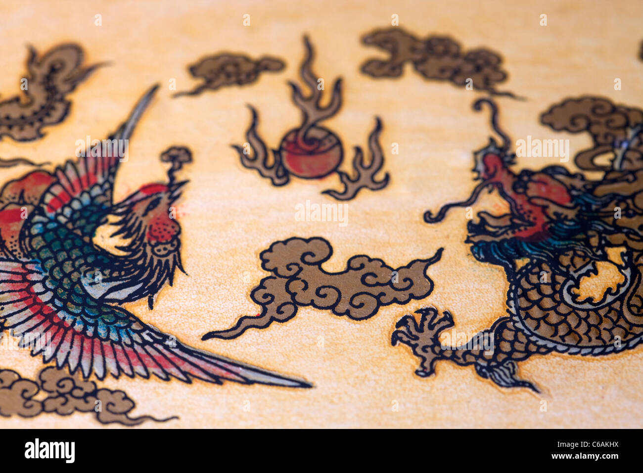 Close-up of Chinese painting depicting a phoenix and dragon Stock Photo ...